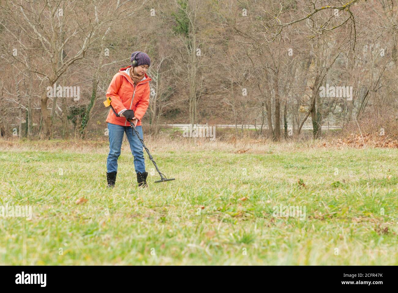 Woman with metal detector hi-res stock photography and images - Alamy