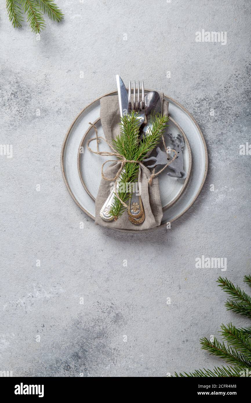 Cristmas table cutlery set with holiday decoration. Top view, copy ...