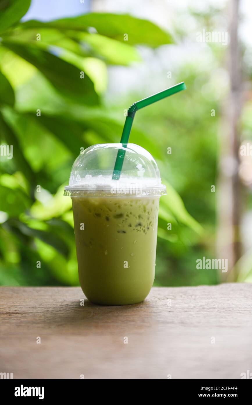 iced drinks green tea smoothie / Matcha green tea with milk on plastic ...