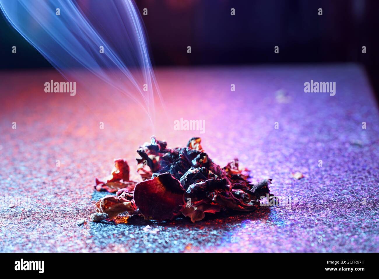 Closeup shot of burnt rose petals and smoke Stock Photo - Alamy