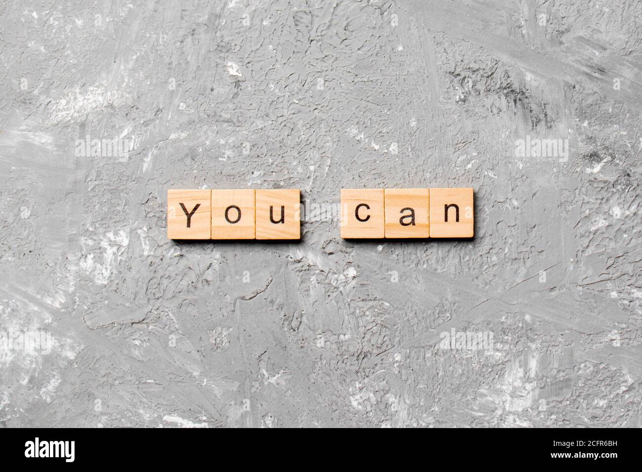 You can word written on wood block. You can text on cement table for ...