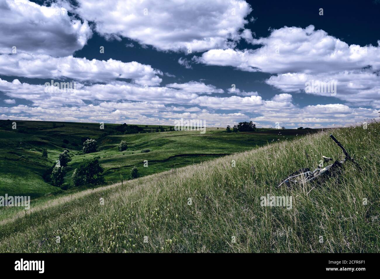 Mountain bike in wild nature landscape background. Panoramic landscape ...