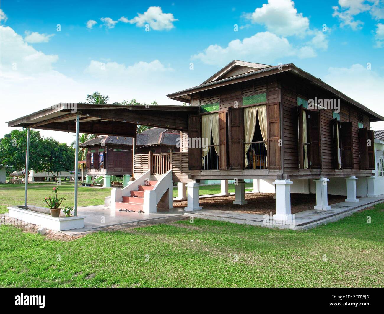 Traditional malay wooden house in village Stock Photo - Alamy