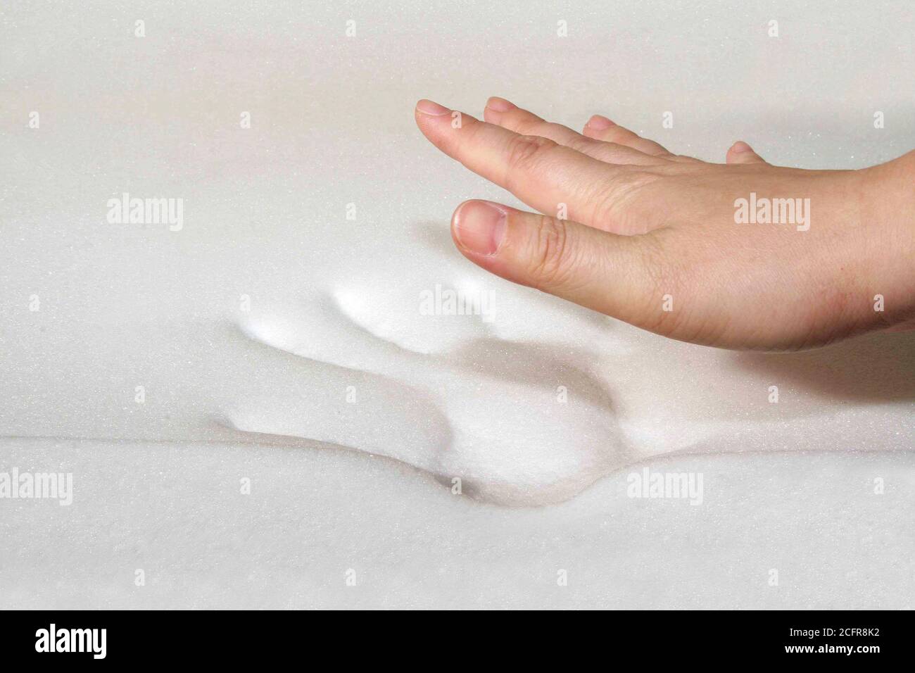 Hand stamp on memory foam Stock Photo - Alamy