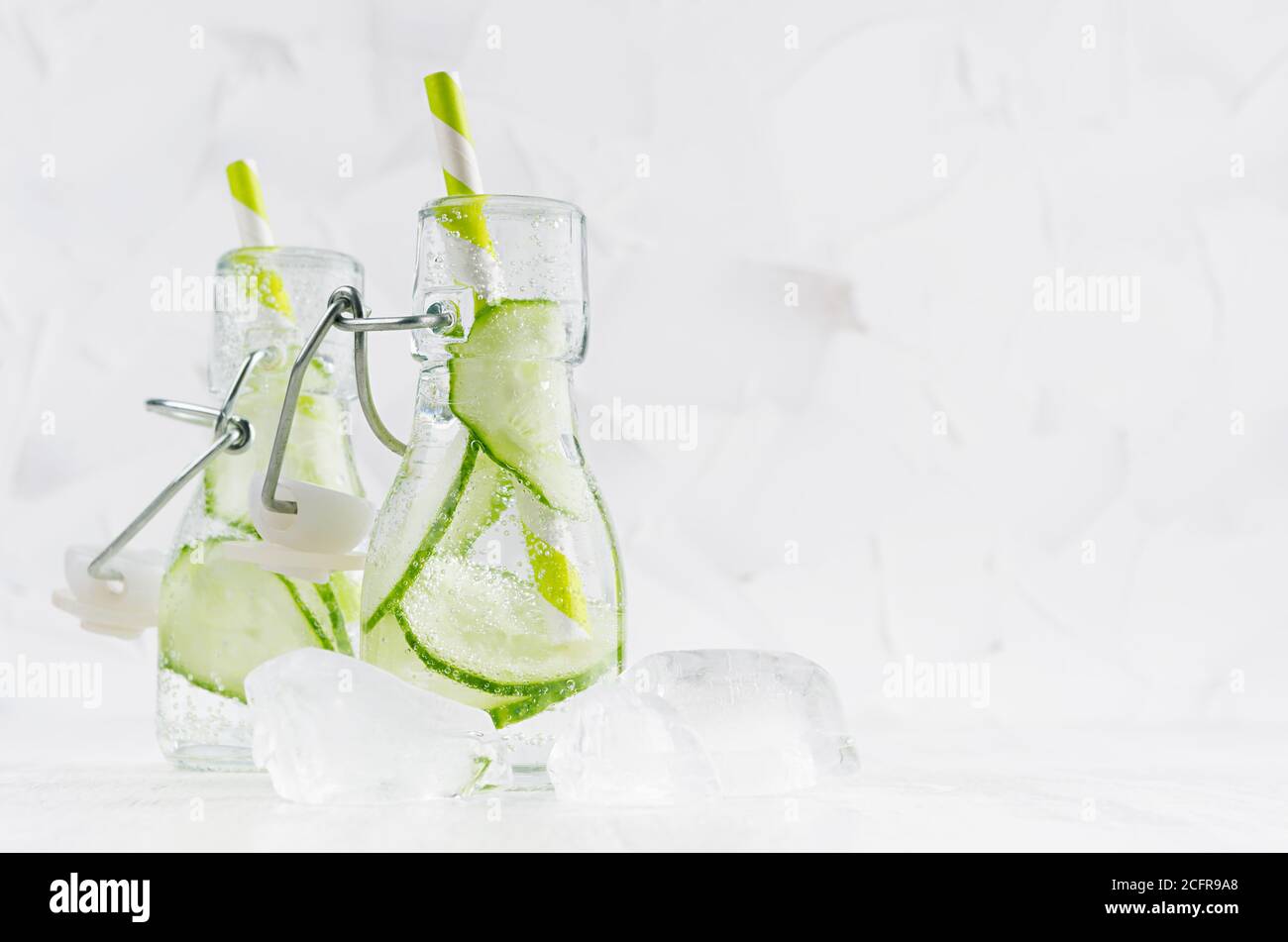 Summer homemade drinks - infused green cucumber water with slices, soda ...