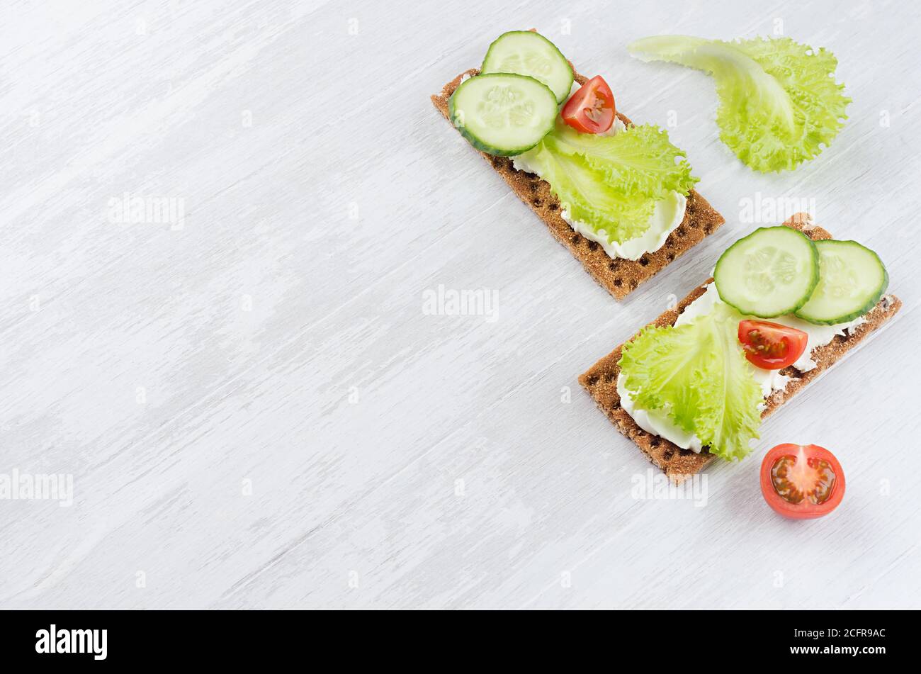 Healthy dietary breakfast of crisps rye flat toast with fresh ...