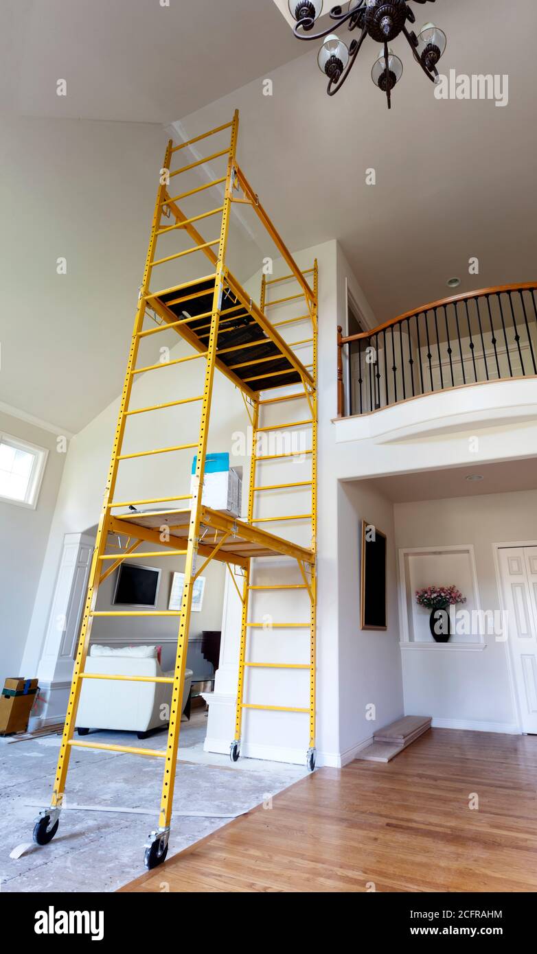 Scaffolding setup for repairing home ceiling and painting purposes ...