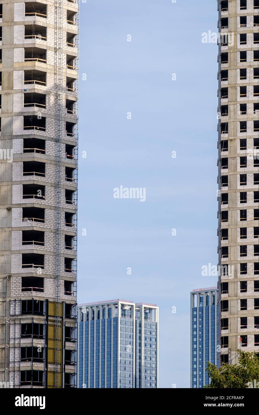 View of modern skyscrapers made of glass and concrete against the sky ...