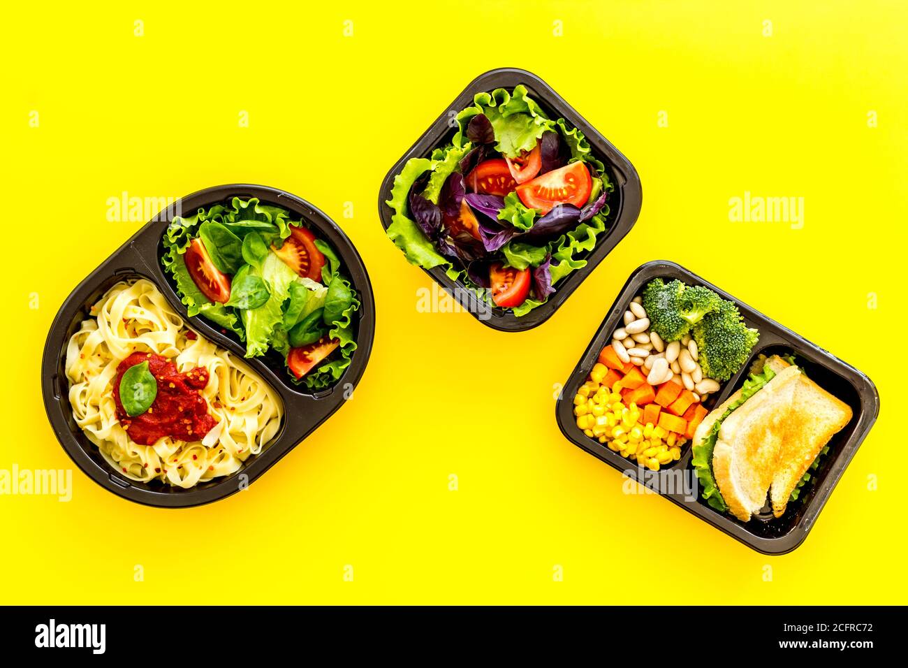 Food delivery background. Take away meal in boxes. Top view Stock Photo ...
