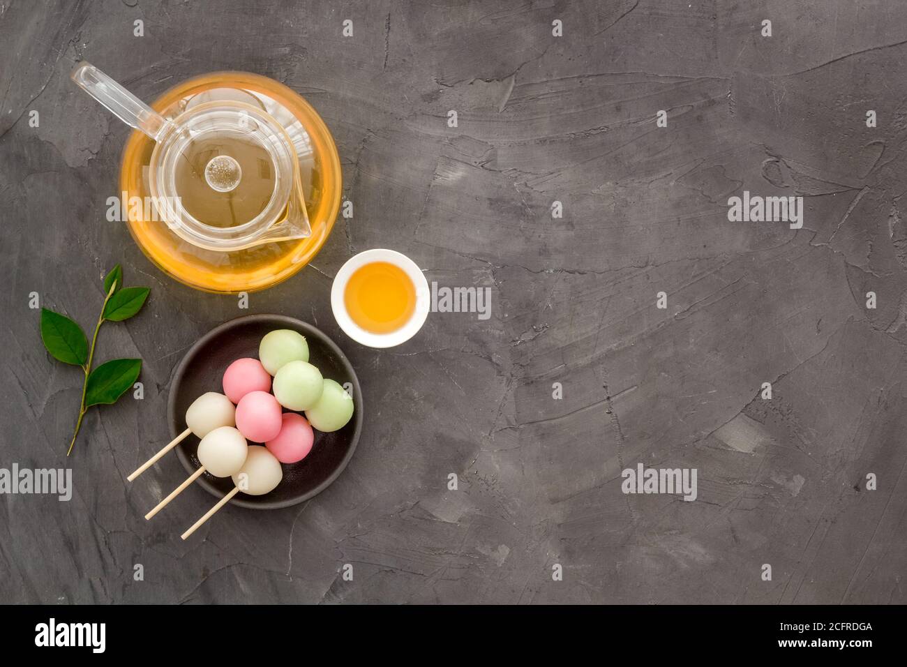 Asian dessert Dango rice dumplings and japanese tea Stock Photo - Alamy
