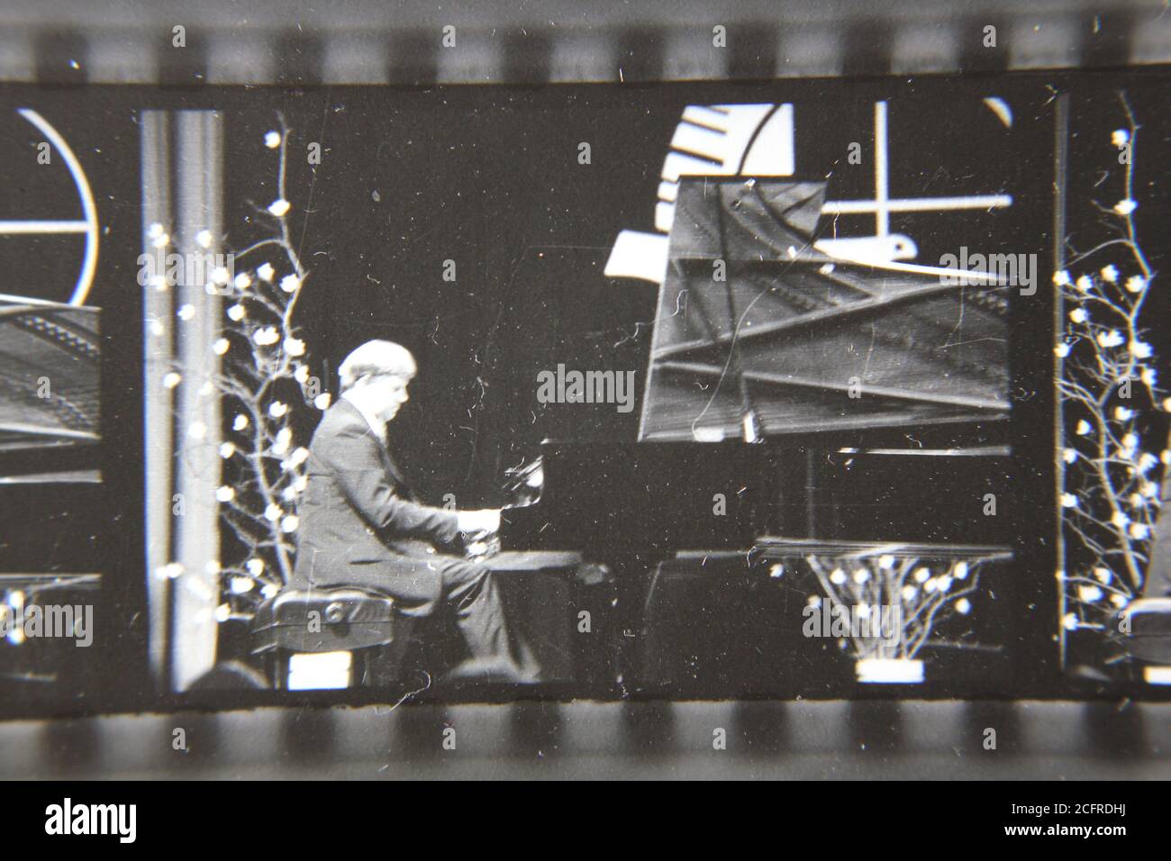 Fine 1970s vintage black and white photography of a man playing the ...