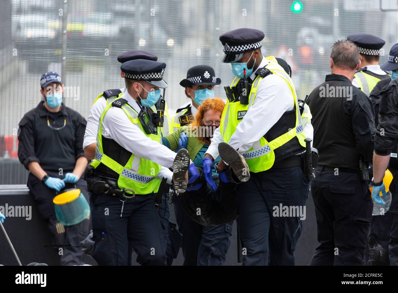 Police arresting woman hi-res stock photography and images - Alamy