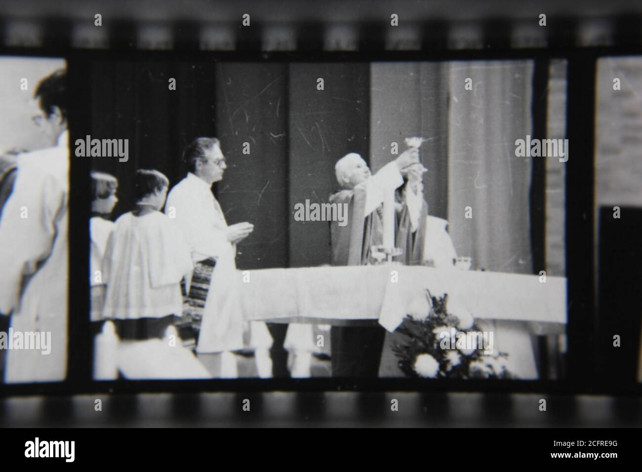 Fine 1970s vintage black and white photography of a priest performing ...