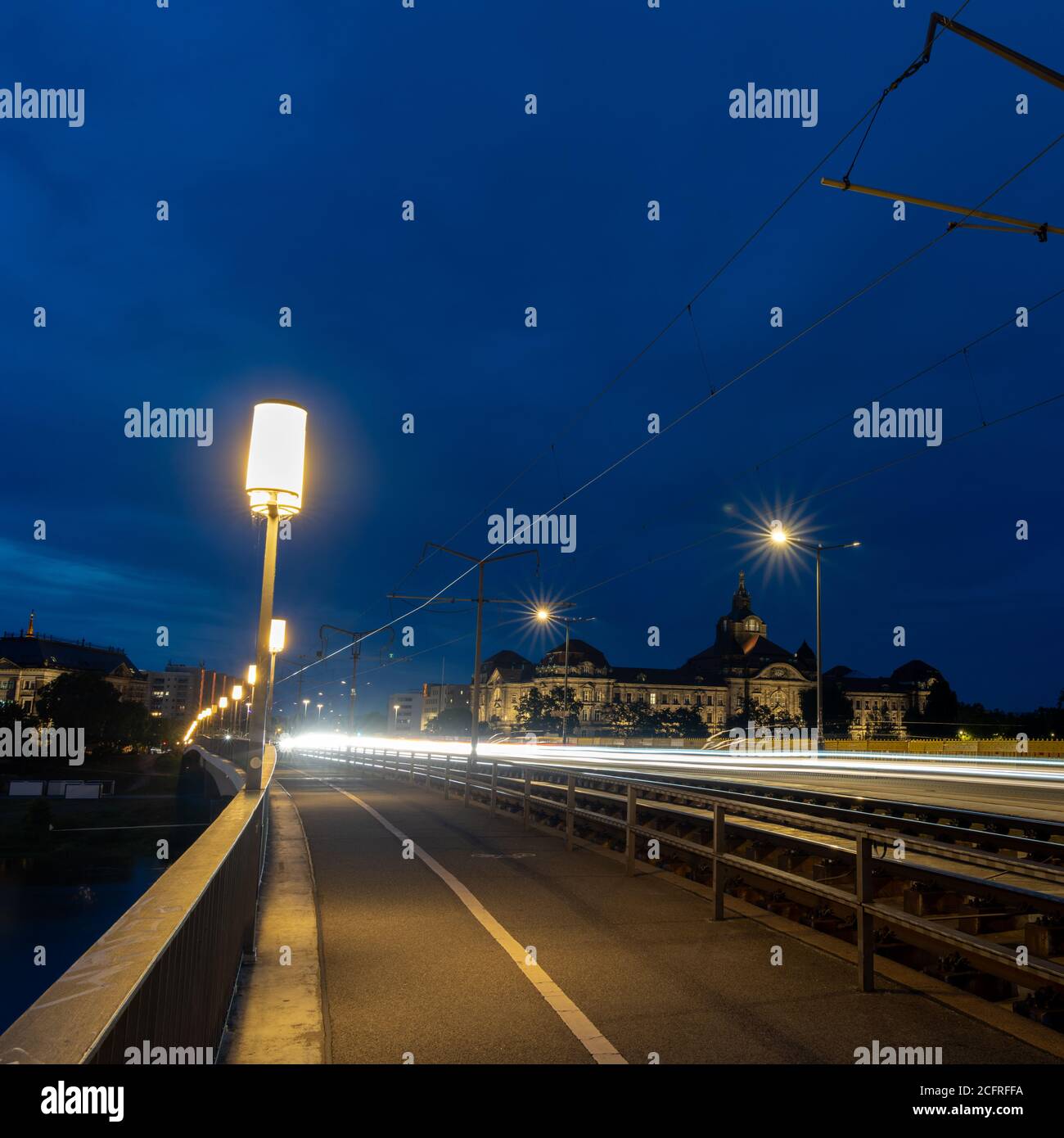 A long exposure of traffic crossing the Carola Bridge over the Elbe ...