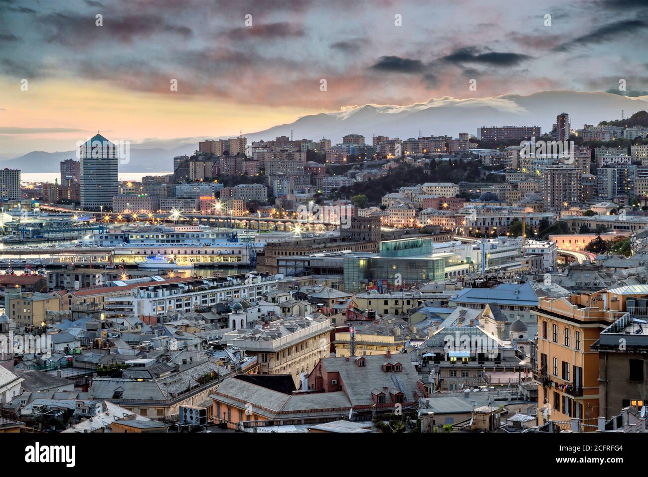 Rooftop view of the Old Port, Genoa, Liguria, Italy at dusk with ...