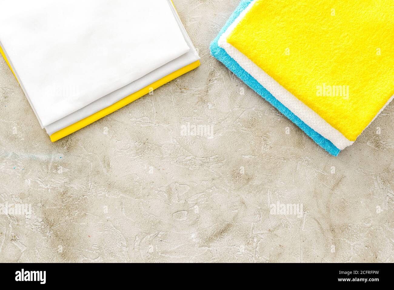 Clean laundry - clothes and towels top view Stock Photo - Alamy