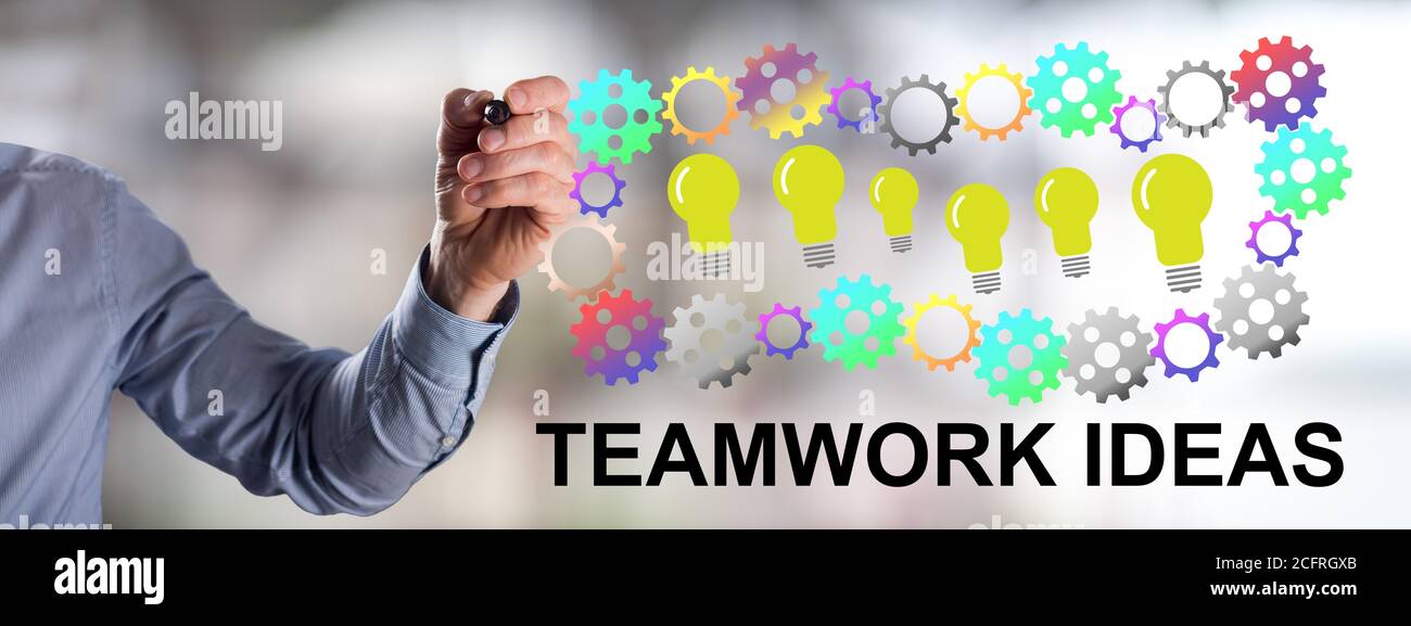 Man drawing a teamwork idea concept Stock Photo - Alamy