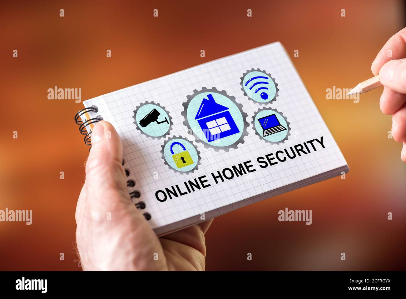 Hand drawing online home security concept on a notepad Stock Photo - Alamy