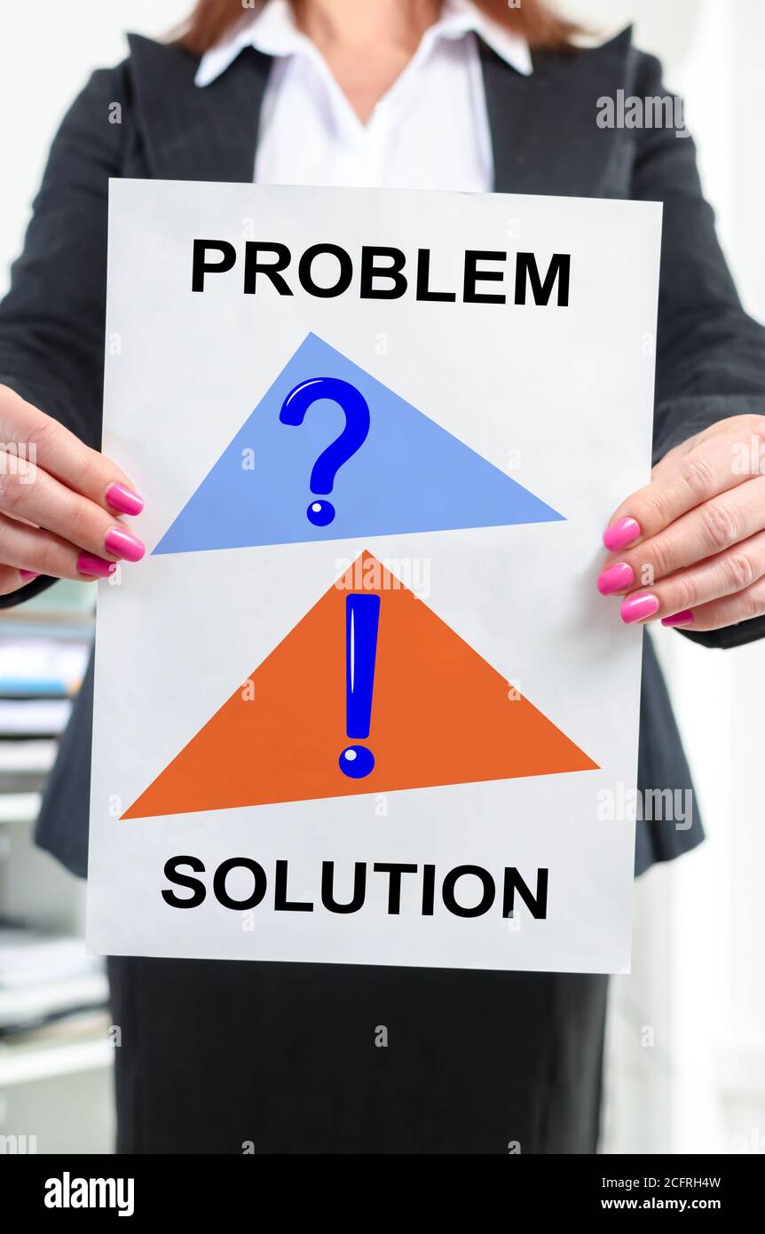 Paper with problem and solution concept held by a businesswoman Stock ...