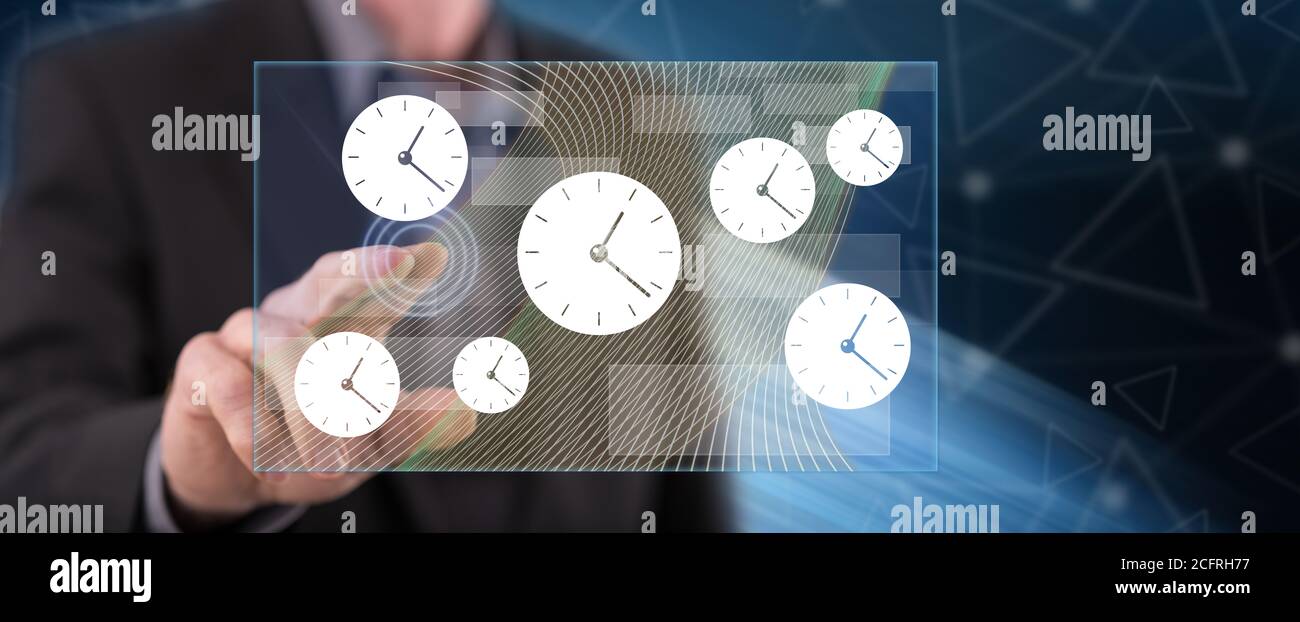 Man touching a time management concept on a touch screen with his ...