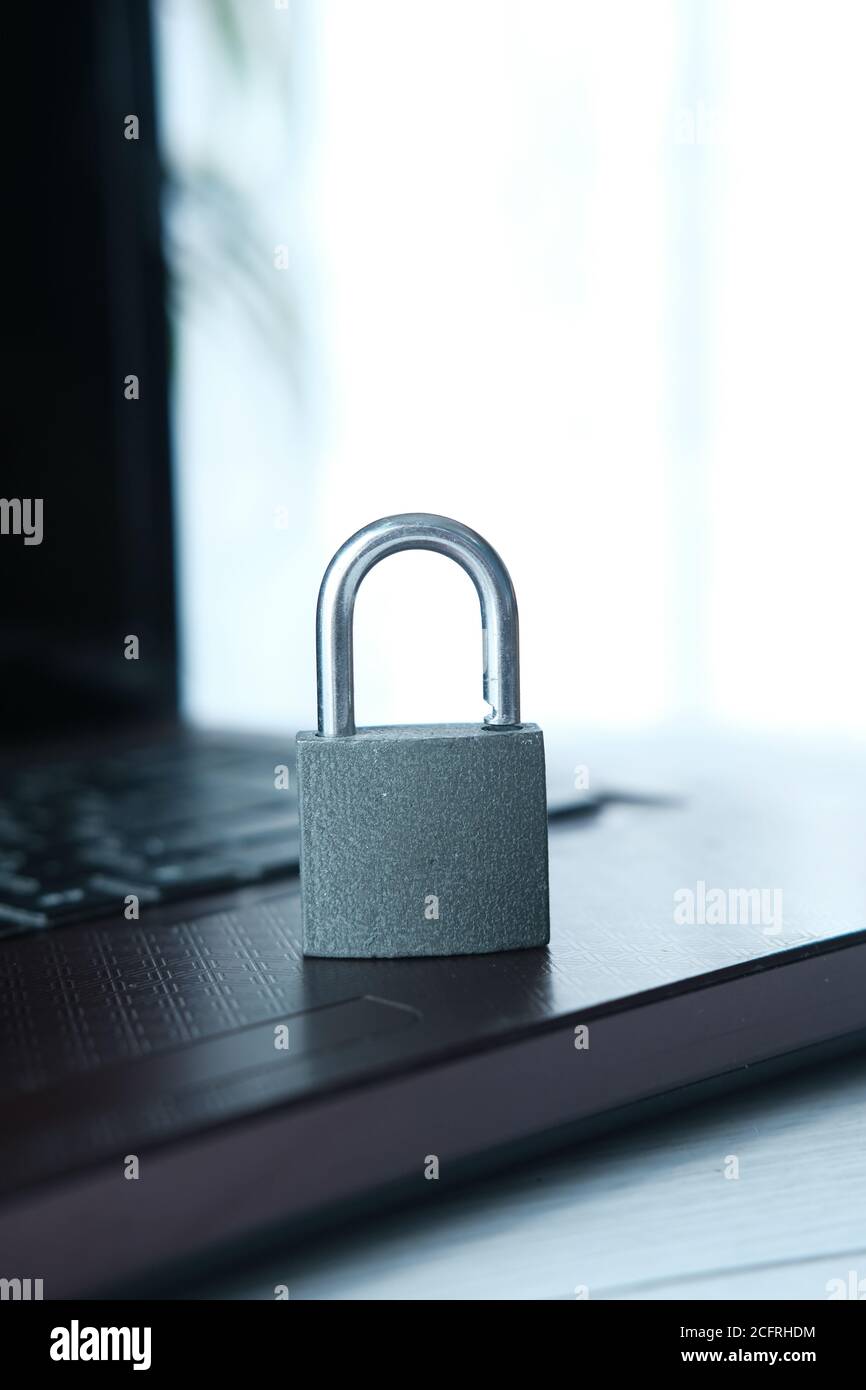 internet safety concept with padlocked on laptop computer keyboard ...
