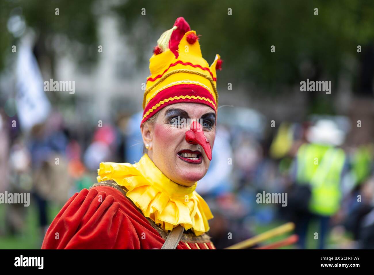 Performer in costume at 'Carnival of Corruption' Extinction Rebellion ...
