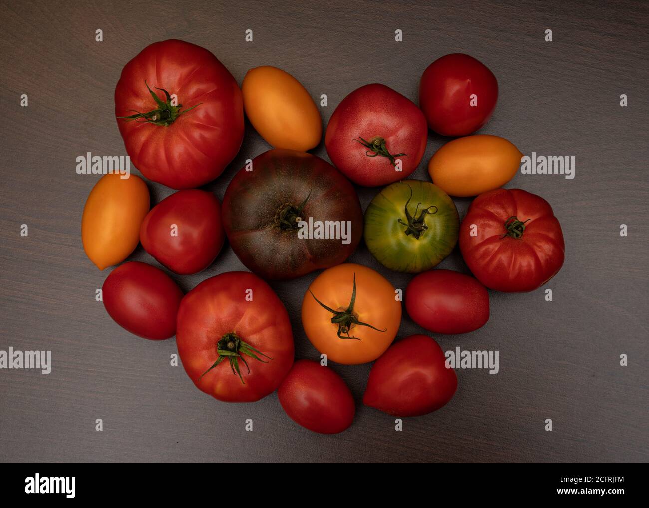 Assortment of different styles of tomatoes in different colors Stock ...