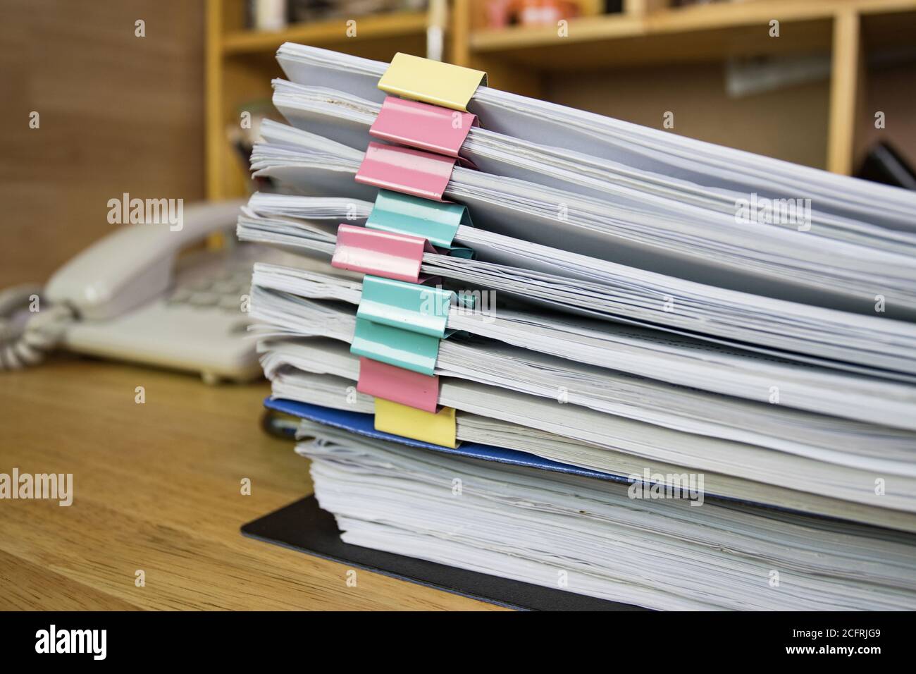 file folder and Stack of business report paper file on the table in a ...