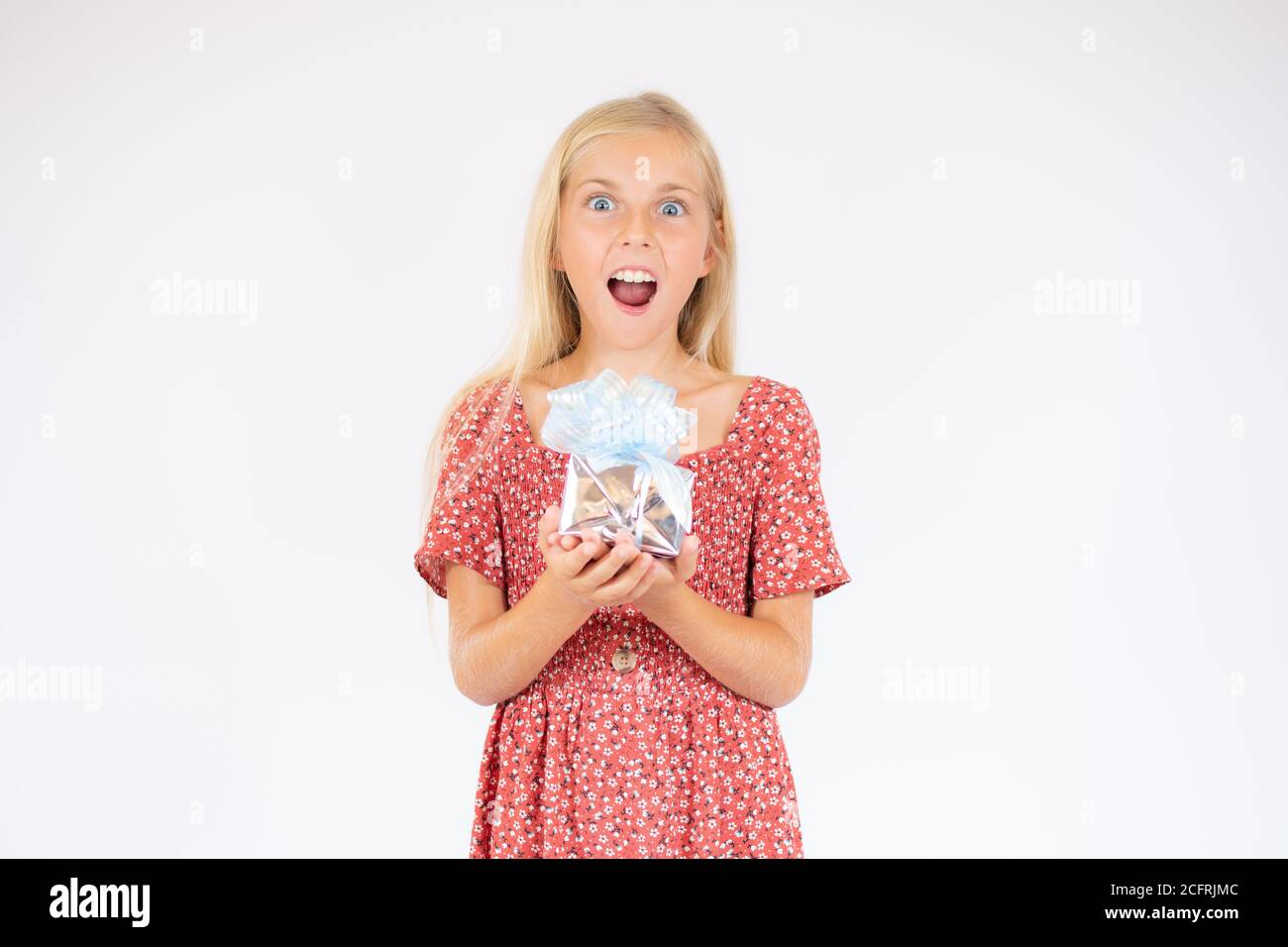 Surprised girl gesturing hands hi-res stock photography and images - Alamy
