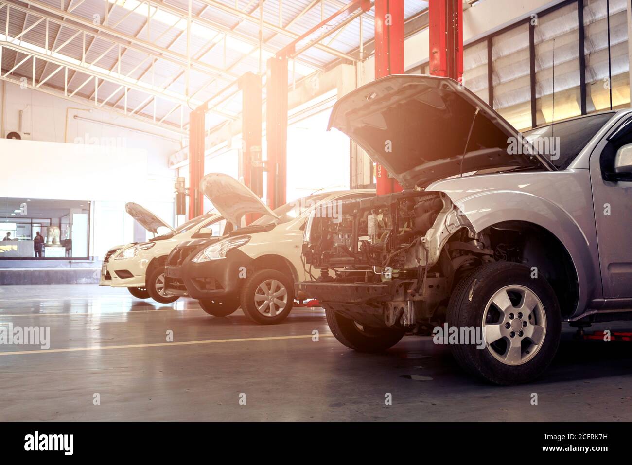 car repair station with soft-focus in the background and over light ...