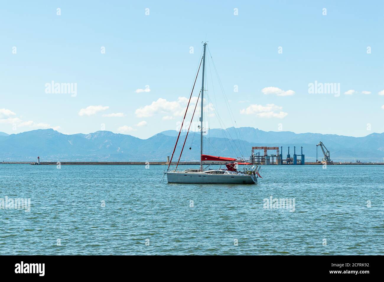 sailing boat in the middle of the sea Stock Photo - Alamy