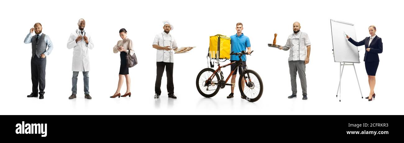 Group of people with different professions on white studio background ...