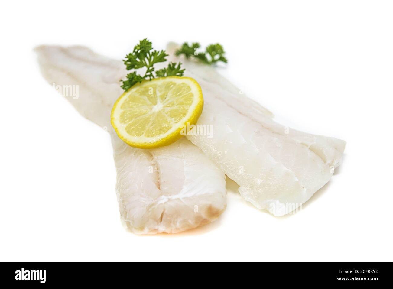 Boneless raw fish fillet isolated on white background Stock Photo - Alamy