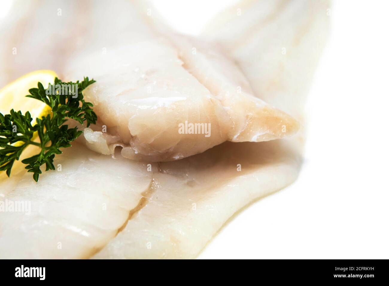 Boneless raw fish fillet isolated on white background Stock Photo - Alamy