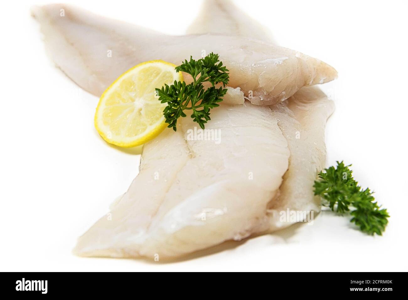 Boneless raw fish fillet isolated on white background Stock Photo - Alamy