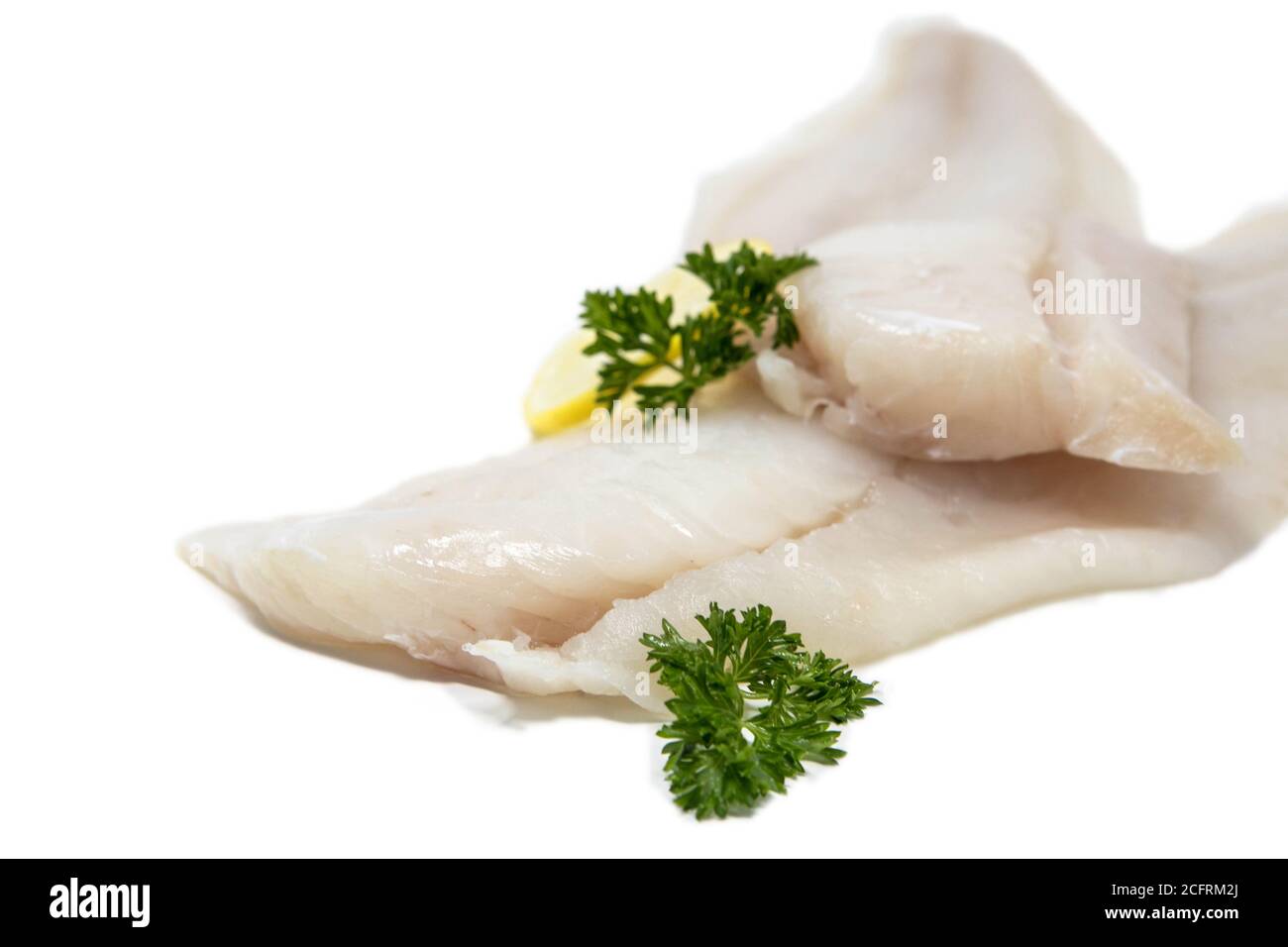 Boneless raw fish fillet isolated on white background Stock Photo - Alamy