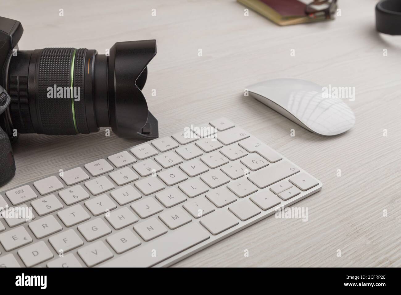 technology, a professional photo camera, a smartphone, mouse and ...