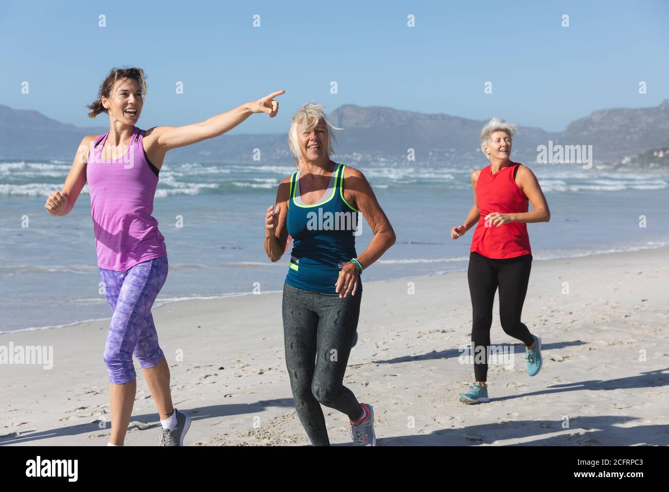 Runner woman jogging on seaside hi-res stock photography and images - Alamy