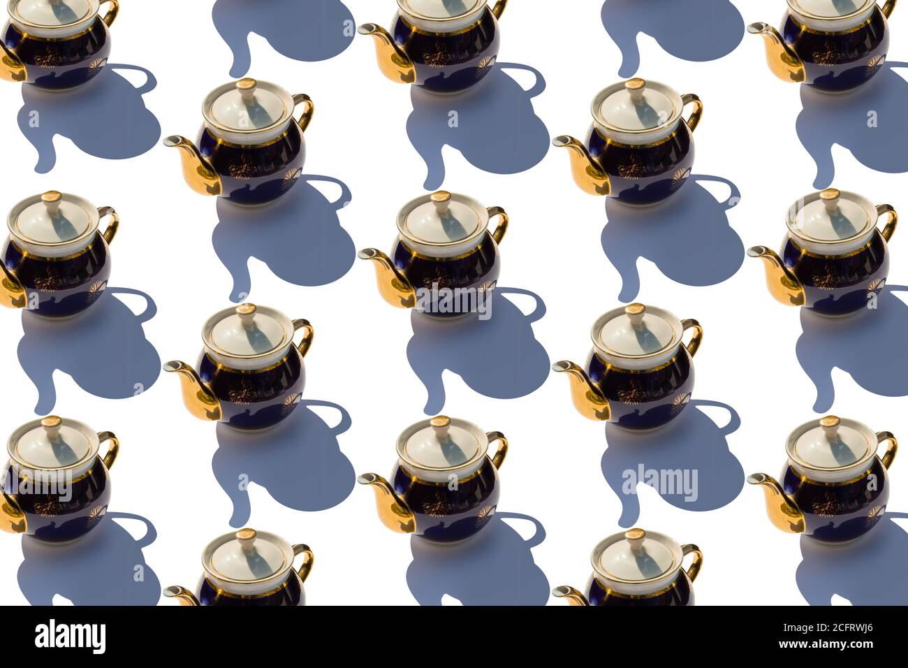 Background from large group of old ceramic teapots. Flat lay, top view ...