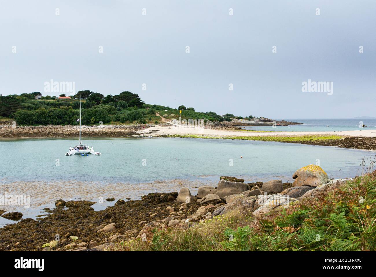 Boats at anchor in The Cove between St Agnes and Gugh, Isles of Scilly ...