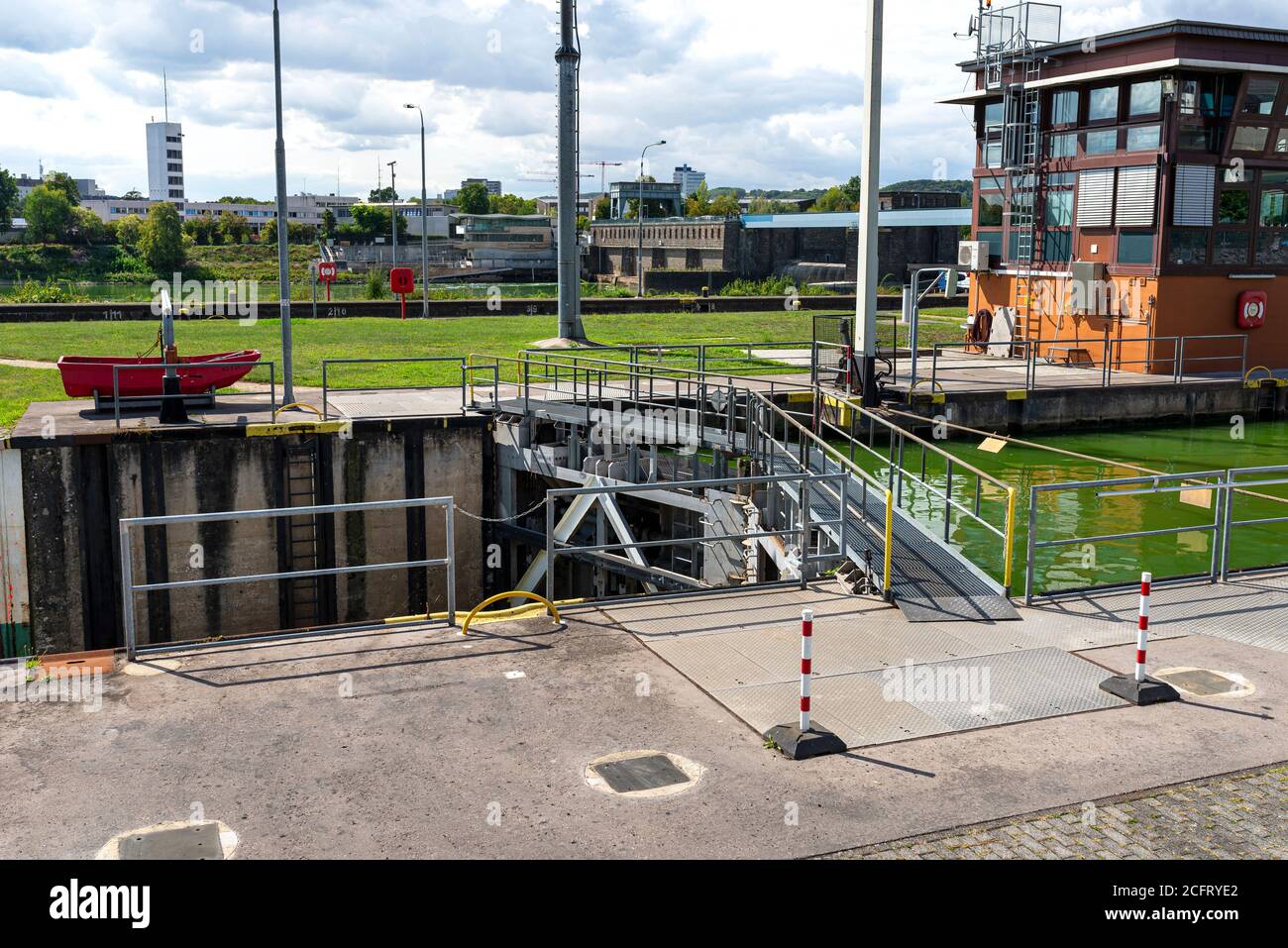 Canal lock and lock house on the Moselle river in West Germany, lock ...