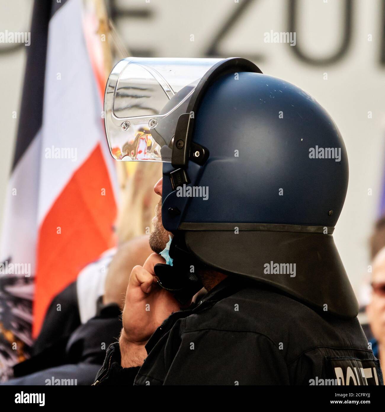 Berlin, Germany, August 29., 2020: Police officer protected by a helmet ...
