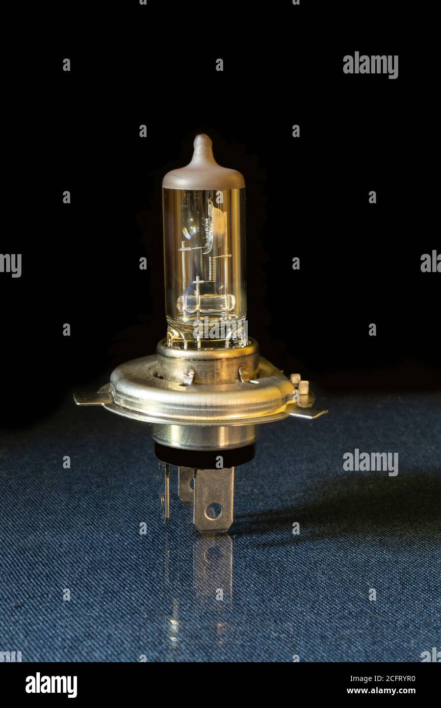 The Halogen lamp for headlights of the car on black background. The ...