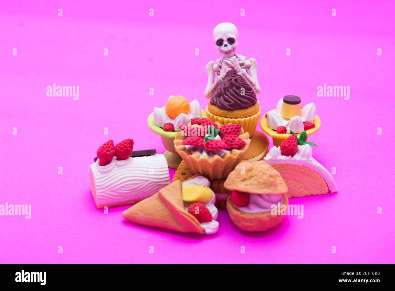 Skeleton sitting on bakery, enjoy eating until death with sweet ...