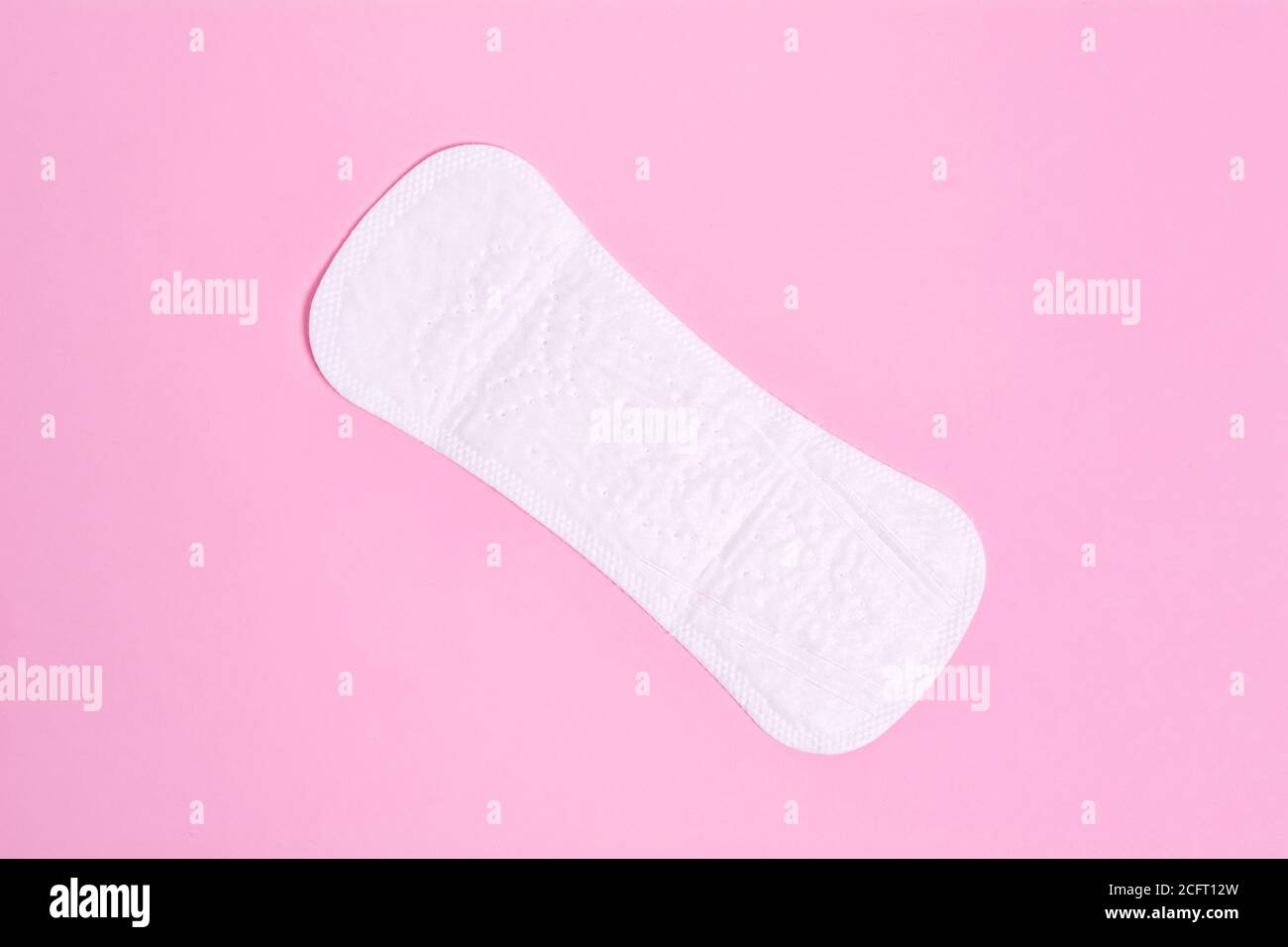 Women's daily panty liner on a pink background. Intimate hygiene ...