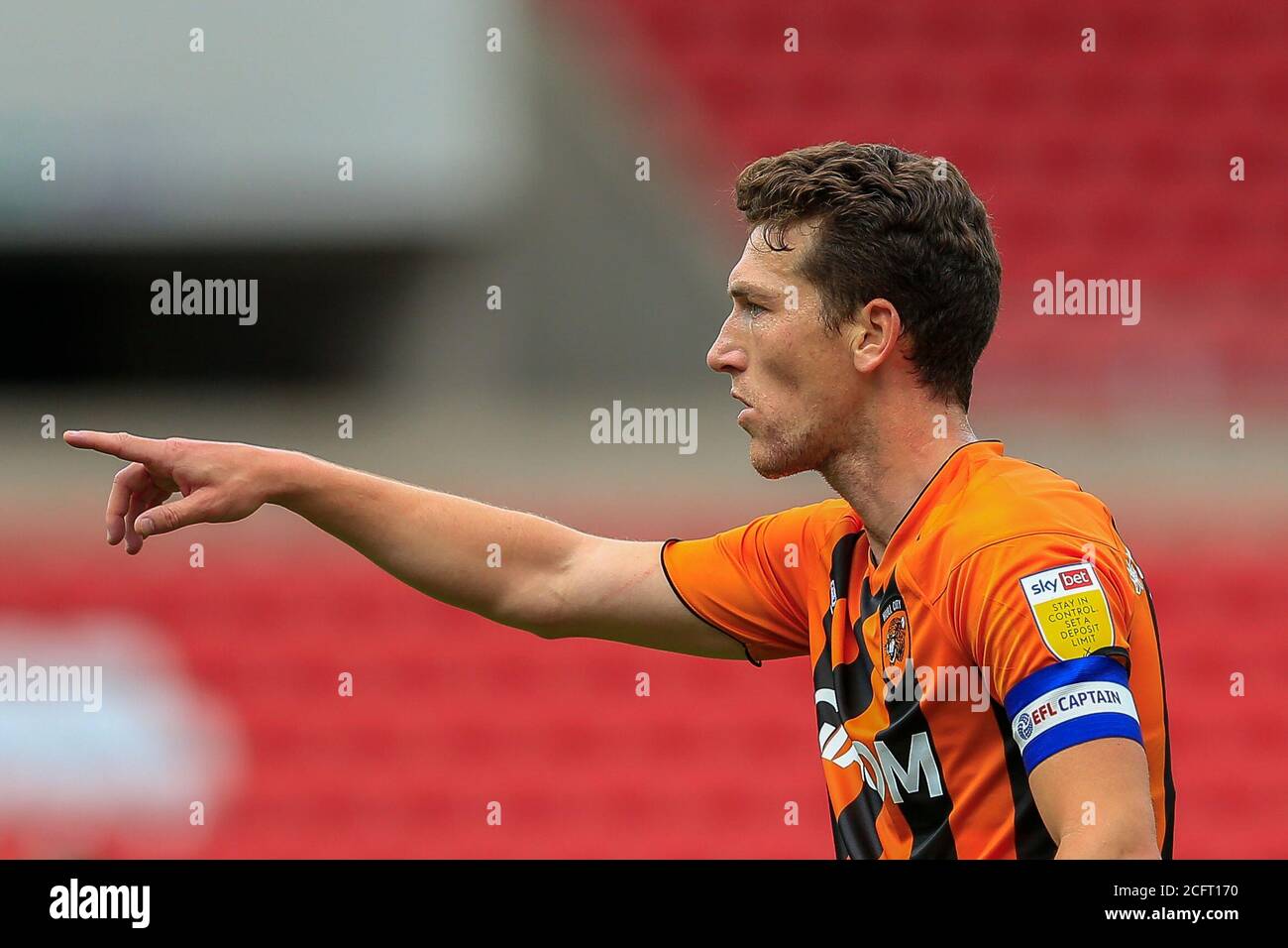 Richard Smallwood (6) of Hull City instructs his players Stock Photo ...