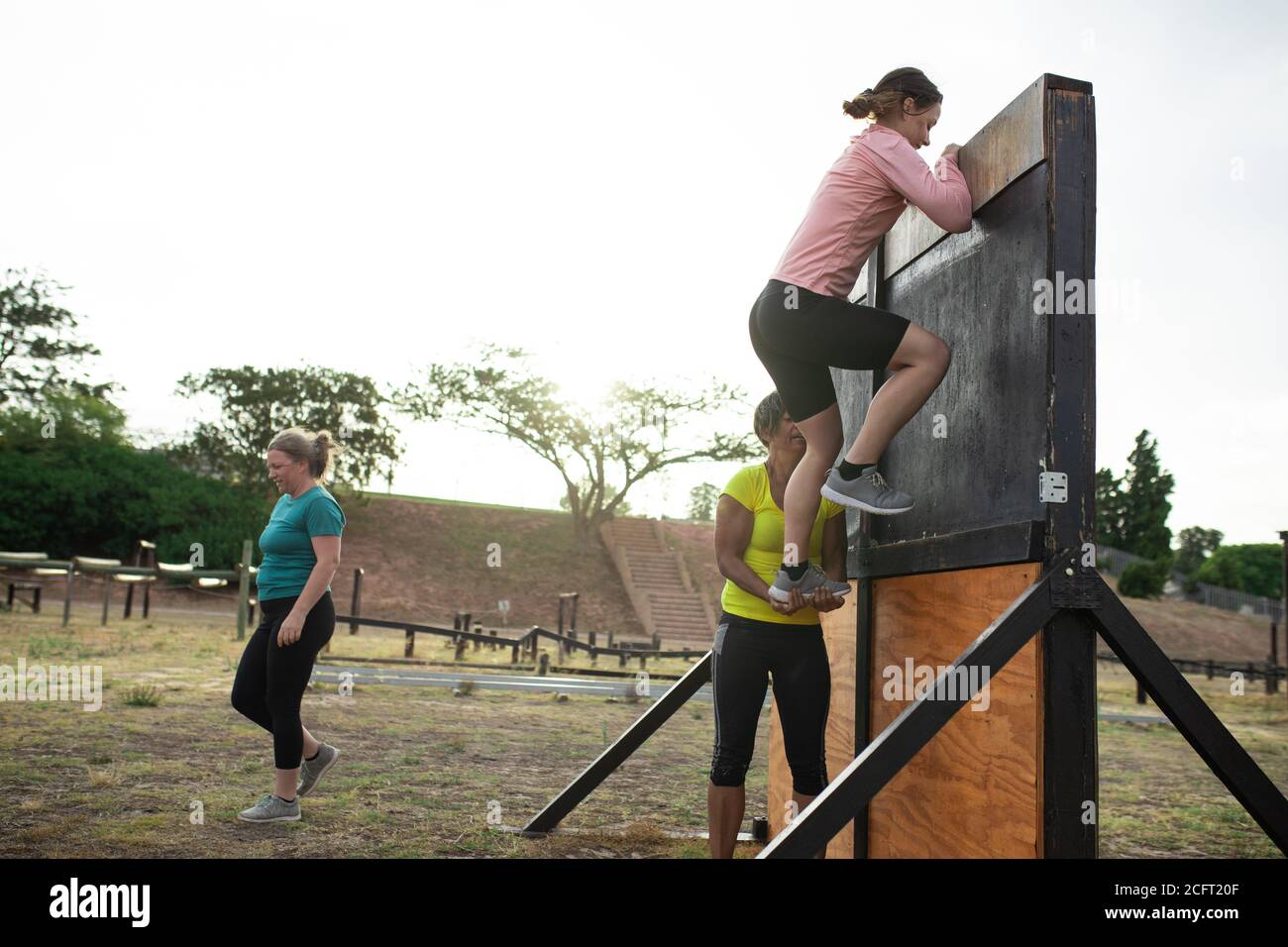 Group climbing a wall hi-res stock photography and images - Alamy