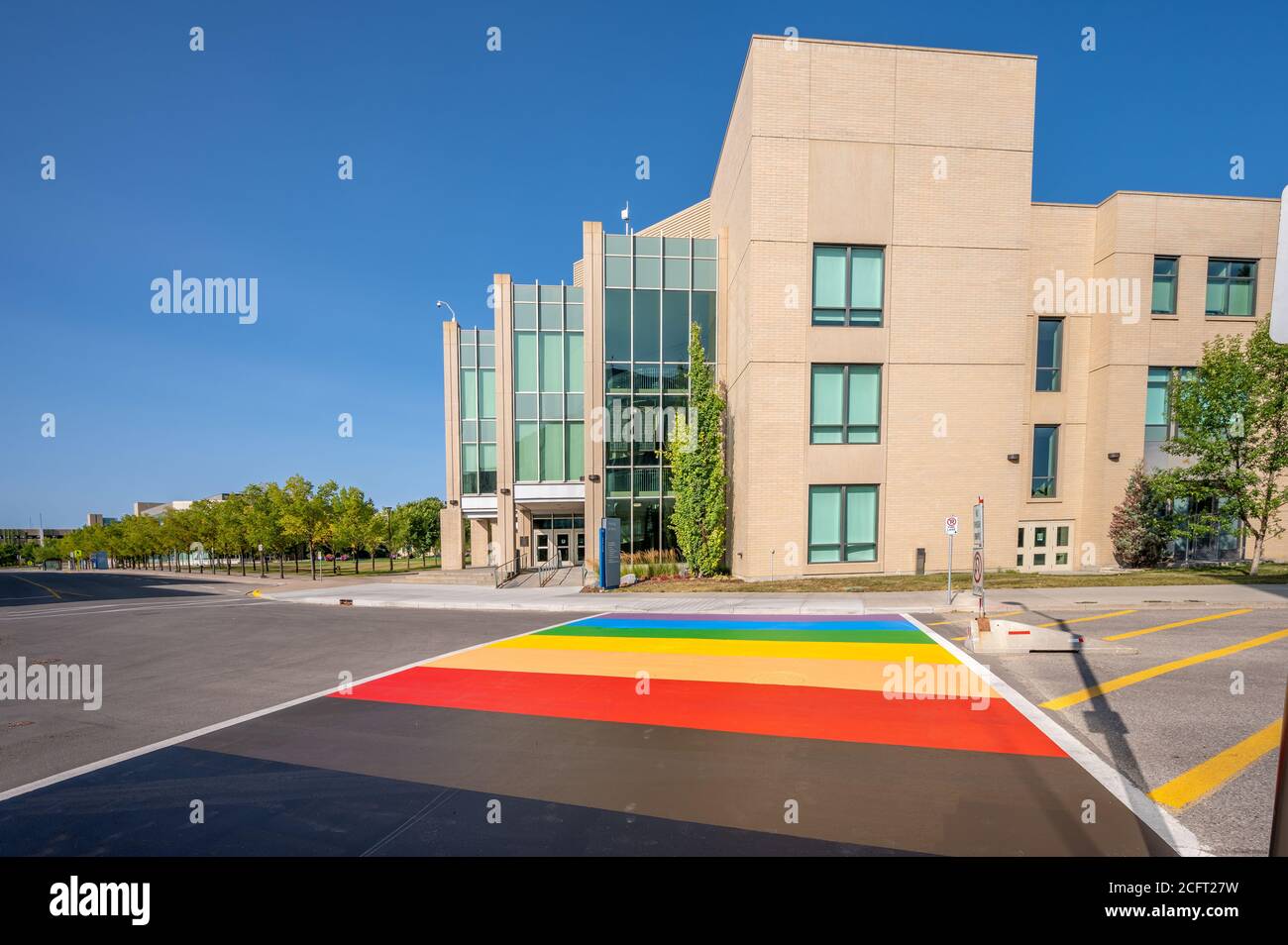Pride Flag painted on sidewalk outside of buildings on the Mount Royal ...