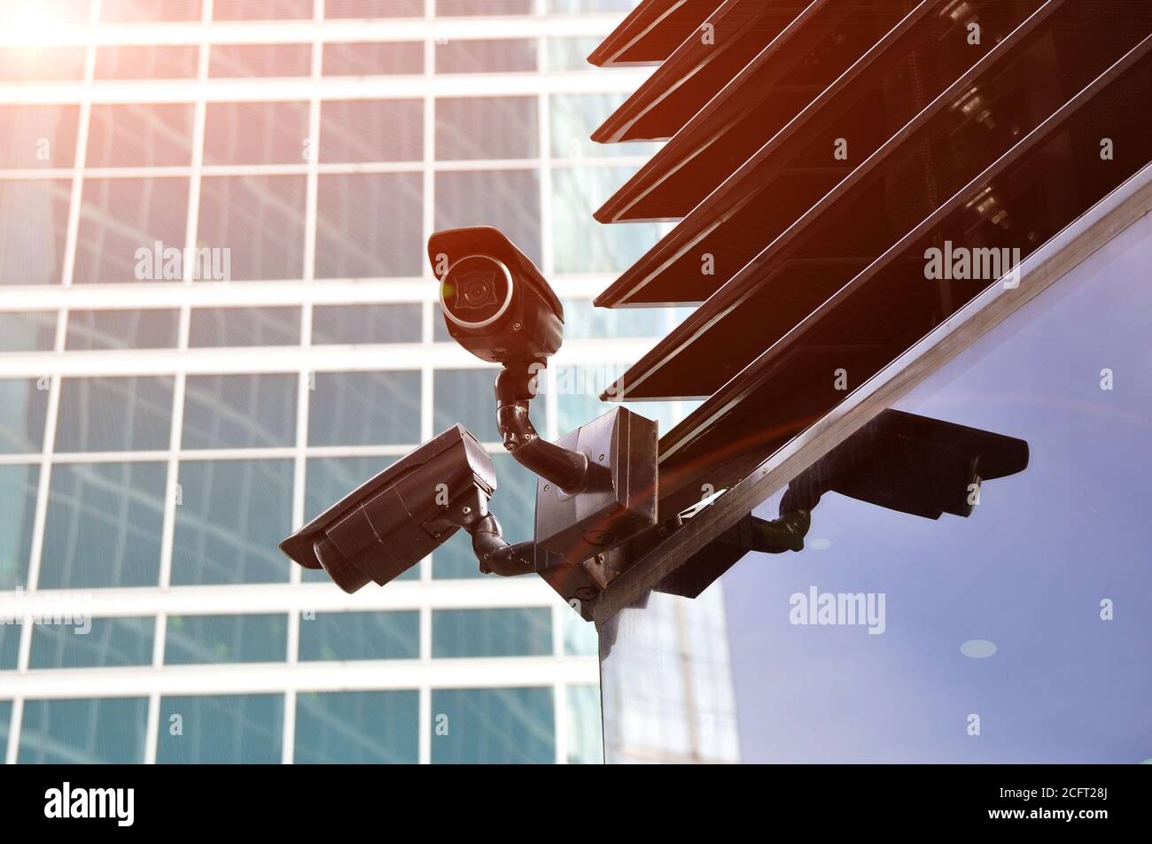 Security cameras in the structure of a modern city Stock Photo - Alamy