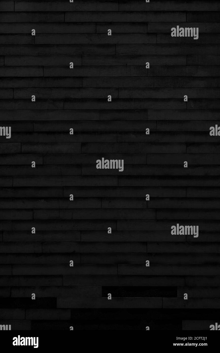 Black brick building wall. Interior of a modern loft. Background for ...